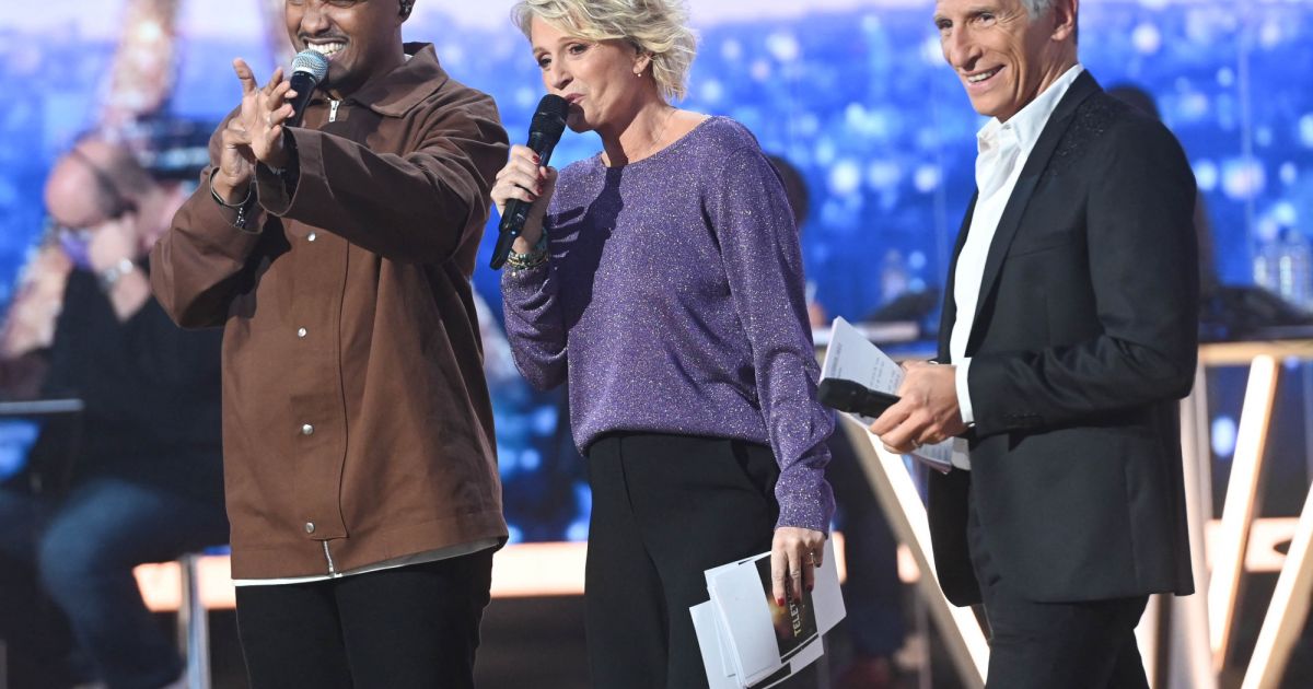 Soprano, Sophie Davant et Nagui - 36ème Edition du Téléthon à Paris. Le 2 décembre 2022 © Coadic ...