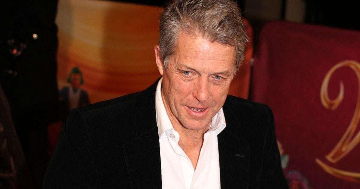 Paris, FRANCE - Actor Hugh Grant is all smiles as she greets a large ...