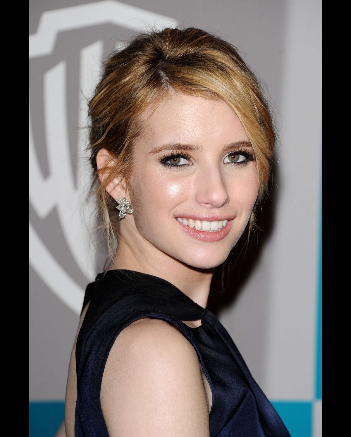 Photo : Emma Robert lors d'une apparition aux Golden Globes 2012 ...