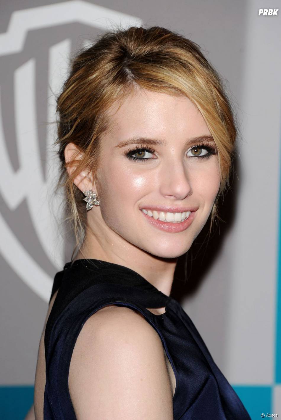 Emma Robert lors d'une apparition aux Golden Globes 2012 - Purebreak