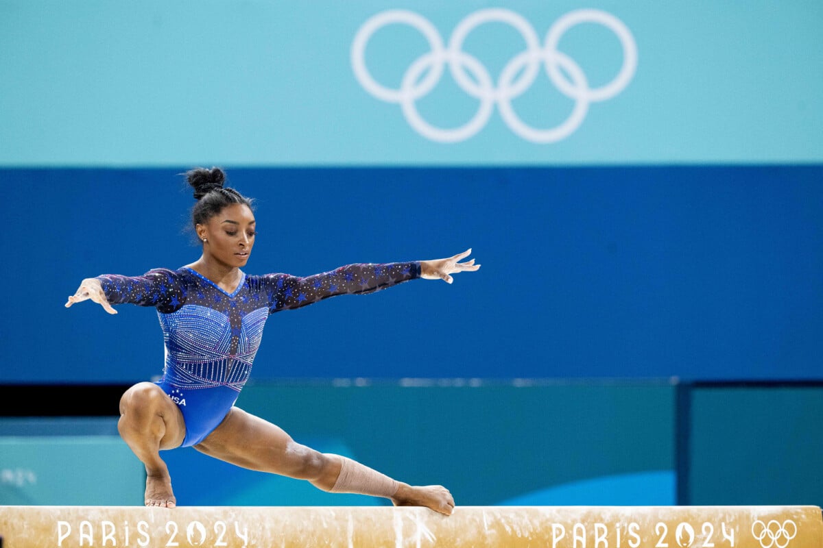 Photo : Simone Biles savoure sa victoire devant son compagnon Jonathan ...